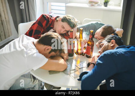 Drunk and tired people sleeping after party Stock Photo - Alamy