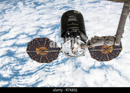 Solar arrays from the International space station floating above earth ...