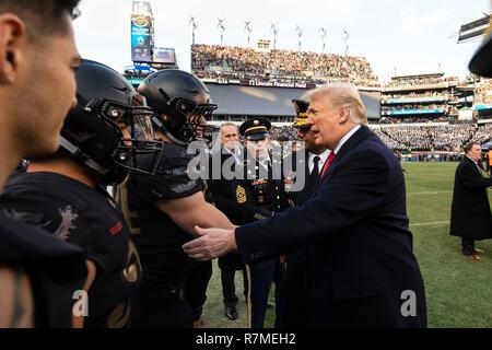 President Donald Trump greets Army cadets during the NCAA college ...