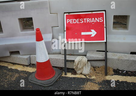 Pedestrian Dented Metal Roadwork Sign and Traffic Cone Stock Photo - Alamy