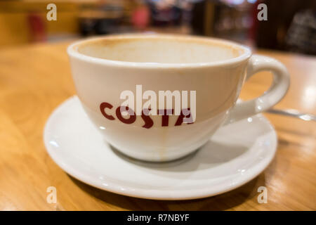 A used empty Costa coffee cup in a UK coffee shop Stock Photo - Alamy