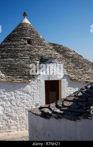 The white stone house with a tile roof on seacoast Stock Photo - Alamy