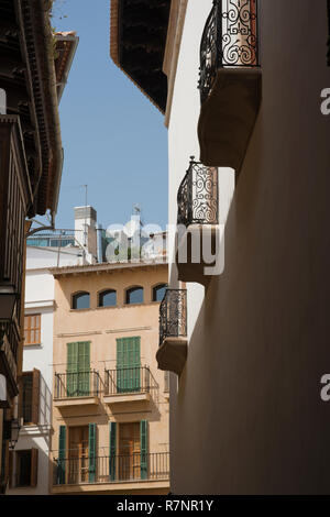 Balconies on upper stories of buildings in the Calle de la Portella ...