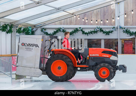 Preparing the ice skate rink at Winchester Cathedral ice skating rink ...