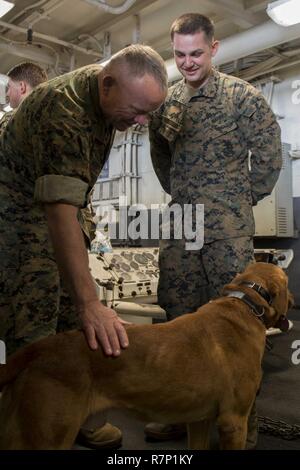 U.S. Marine Lance Cpl. Gage Kirkpatrick, a satellite transmissions ...