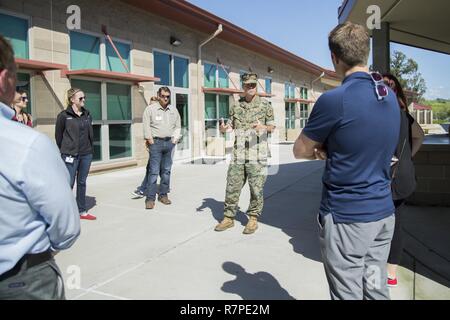 U.S. Marine Corps Col. Brandon W. Graham (left), the commanding officer ...