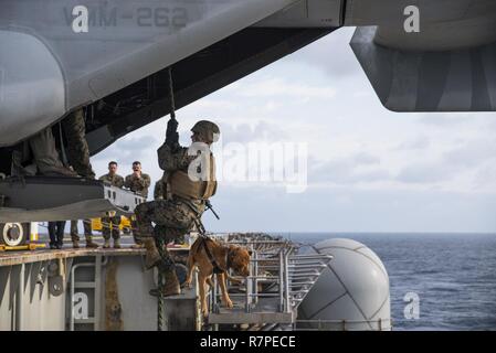 U.S. Marine Lance Cpl. Gage Kirkpatrick, a satellite transmissions ...