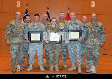 (Left to Right) Maj. Gen. Greg Brady, Maj. Thomas Carnes, Capt. Shelby ...