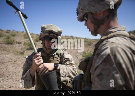 A US Marine Corps Weapons Technician Shows Off 20mm High Explosive ...