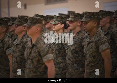 U.S. Marine Corps Pfc. Maria Daume, center, a mortarman assigned to ...