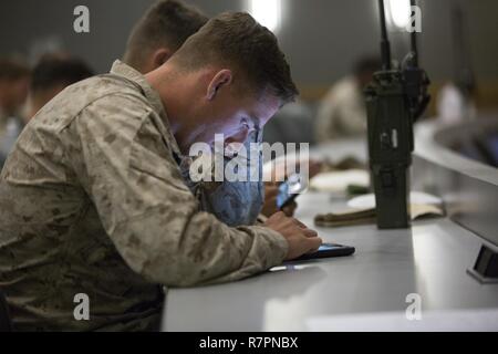 U.S. Marines with the All Type Model Series Armament Team (ATAT) re-arm ...