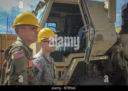 Sgt. Rogers and Pvt. 1st Class Milko of New Jersey Army National Guard's 104th Brigade Engineers ...