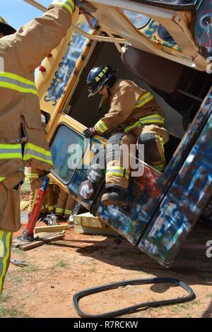 A firefighter from the 507th Civil Engineer Squadron (CES) prepares to ...