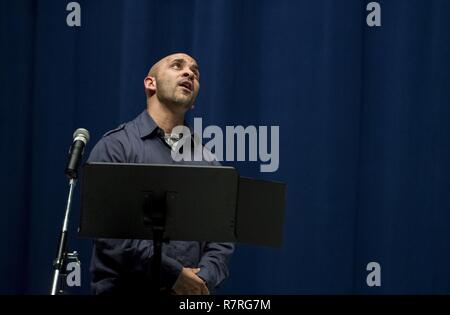 Victor Almanzar, actor, preforms during a scene of, “Jesus Hopped The ...