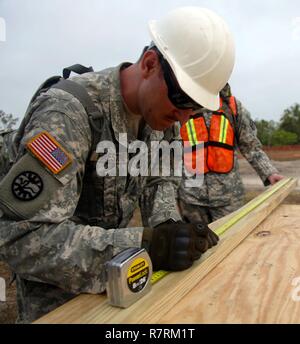 Sgt. Ramon Firestone, an engineer with the 672nd Engineer Company, an ...