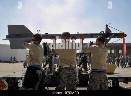 A weapons load crew team from the 2nd Aircraft Maintenance Squadron ...