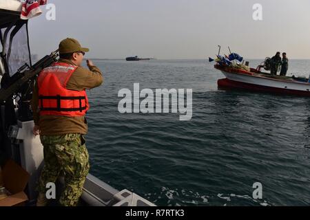 U.S. Coast Guardsmen from the coastal buoy tender USCGC Maria Bray (WLM ...