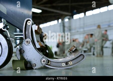 A one-step loading adapter lies on a hangar floor at Shaw Air Force ...