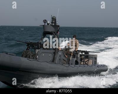Qatar Armed Forces soldiers ride out in a convoy during a joint counter ...