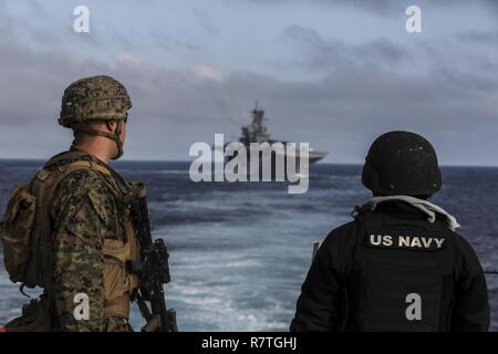 Elements of the U.S. Marines First Division trudge through sand at Chu ...