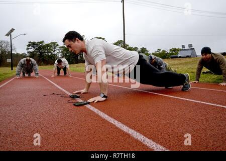 Family members and friends of fallen Airman Capt. David Lyon pose in ...