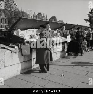 1950s, historical, a parisian gentleman in a beret and raincoat with ...
