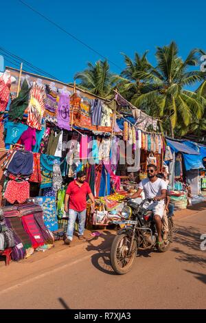 India, Goa, Agonda, clothes and fabric shop in the main shopping street ...
