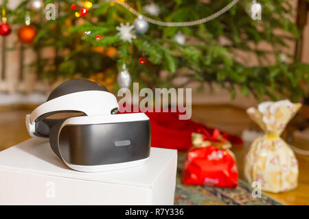 VR headset as gift under the christmas tree with defocused lights Stock ...