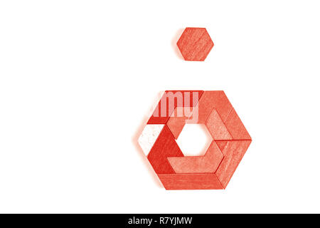 A hexagon tangram puzzle in Living Coral Stock Photo - Alamy