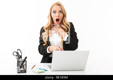 Surprised businesswoman working in office Stock Photo: 54435762 - Alamy