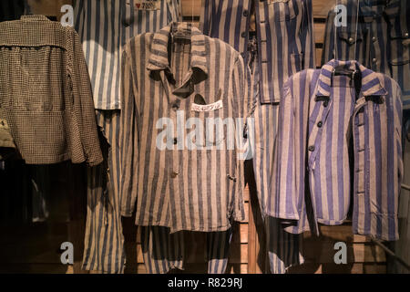 Exhibition with prisoners' clothes in Auschwitz Stock Photo - Alamy