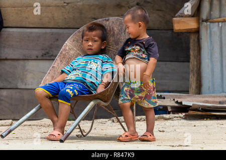 Lao boy in poor in Luang Prabang, Laos Stock Photo - Alamy