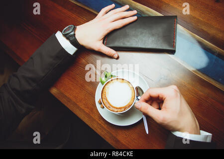 a man holds a clumsy Stock Photo - Alamy