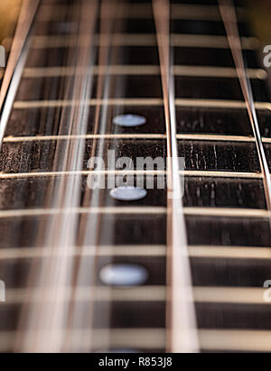 Close up of acoustic guitar with metal strings. Music concept. Hobby ...