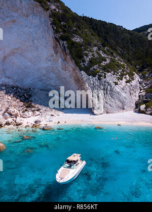 Boats moored in Erimitis Bay, Paxos, Greece Stock Photo - Alamy