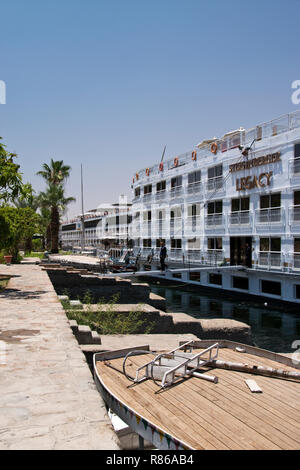 Egypt, Aswan Governorate, Aswan, Boat moored on bank of Nile Stock ...