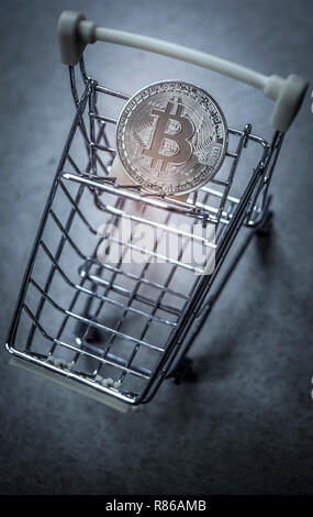 bitcoin in shopping cart - cryptocurrency concept Stock Photo - Alamy