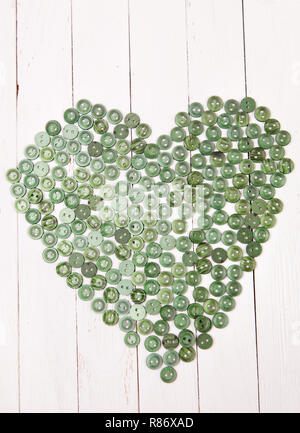 Heart laid out from the buttons Stock Photo - Alamy