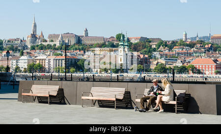 A bench in Budapest near Parliament in winter Stock Photo - Alamy