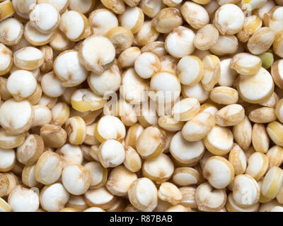 Grain of quinoa extreme closeup. Uncooked raw quinoa as background ...