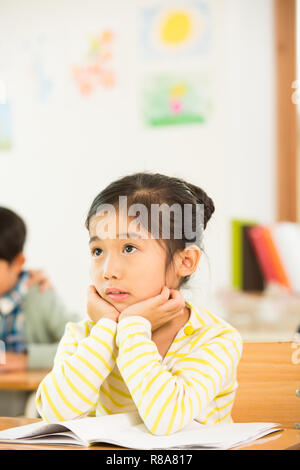 Young Student Looking Lost In Class Stock Photo: 228877873 - Alamy