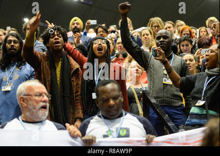 Activists are seen staging a protest during the COP24 UN Climate Change ...