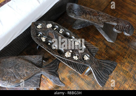 A Philippine mancala strategy board games named Sungka which involves ...