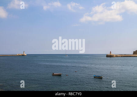 War museum and lighthouse at the harbour of Valletta, Malta Stock Photo ...