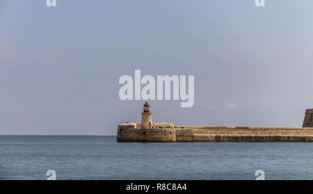 War museum and lighthouse at the harbour of Valletta, Malta Stock Photo ...