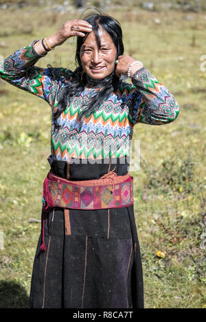 Portrait of a Layap woman near Robluthang, Gasa District, Snowman Trek ...