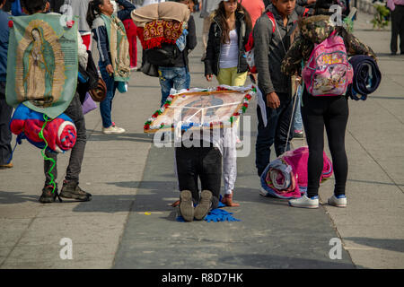 A pilgrim crawling towards the Basilica of Our Lady of Guadalupe in ...