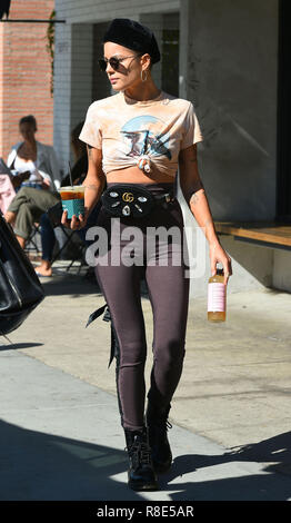 Halsey is all style as she picks up coffee wearing a Gucci belt bag and ...