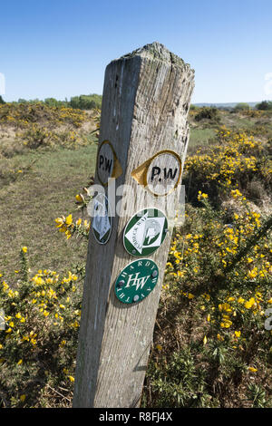 A footpath sign on the Purbeck Way at Corfe Castle in Dorset Stock ...
