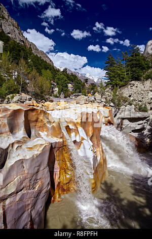 Waterfall of Ganges River flows across the Gangotri town. Uttarakhand ...